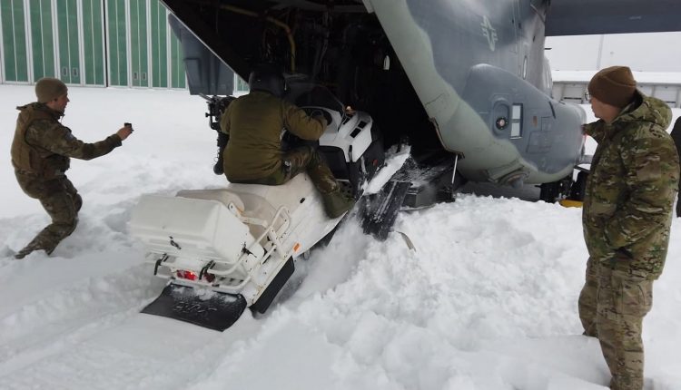 U.S. Air Force tests new snowmobile loading system for CV-22 aircraft