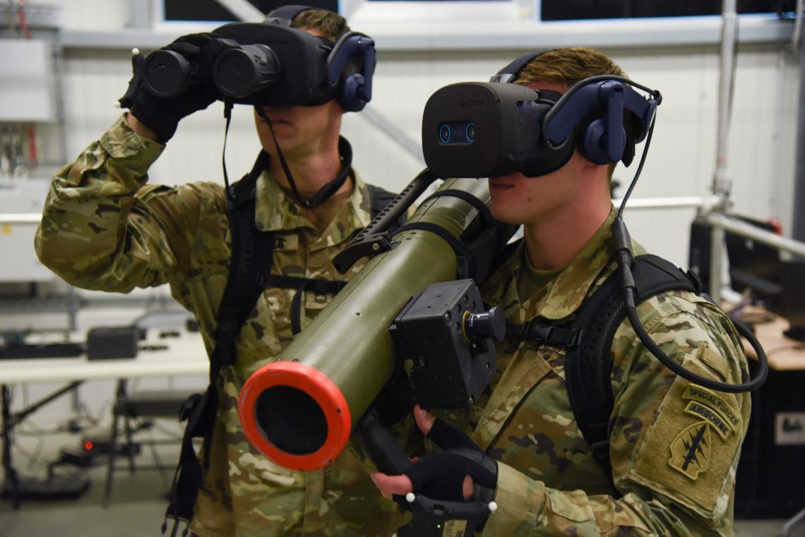 U.S. Soldiers uses virtual reality for training on weapons system to ...