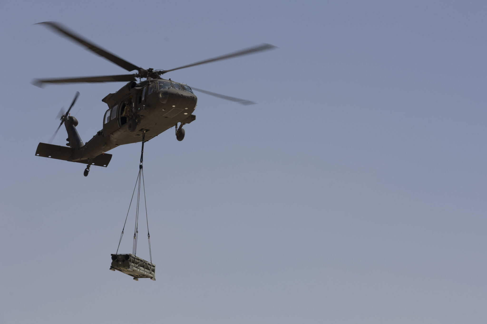 US Army Blackhawk transports HIMARS pod at Eager Lion 2024