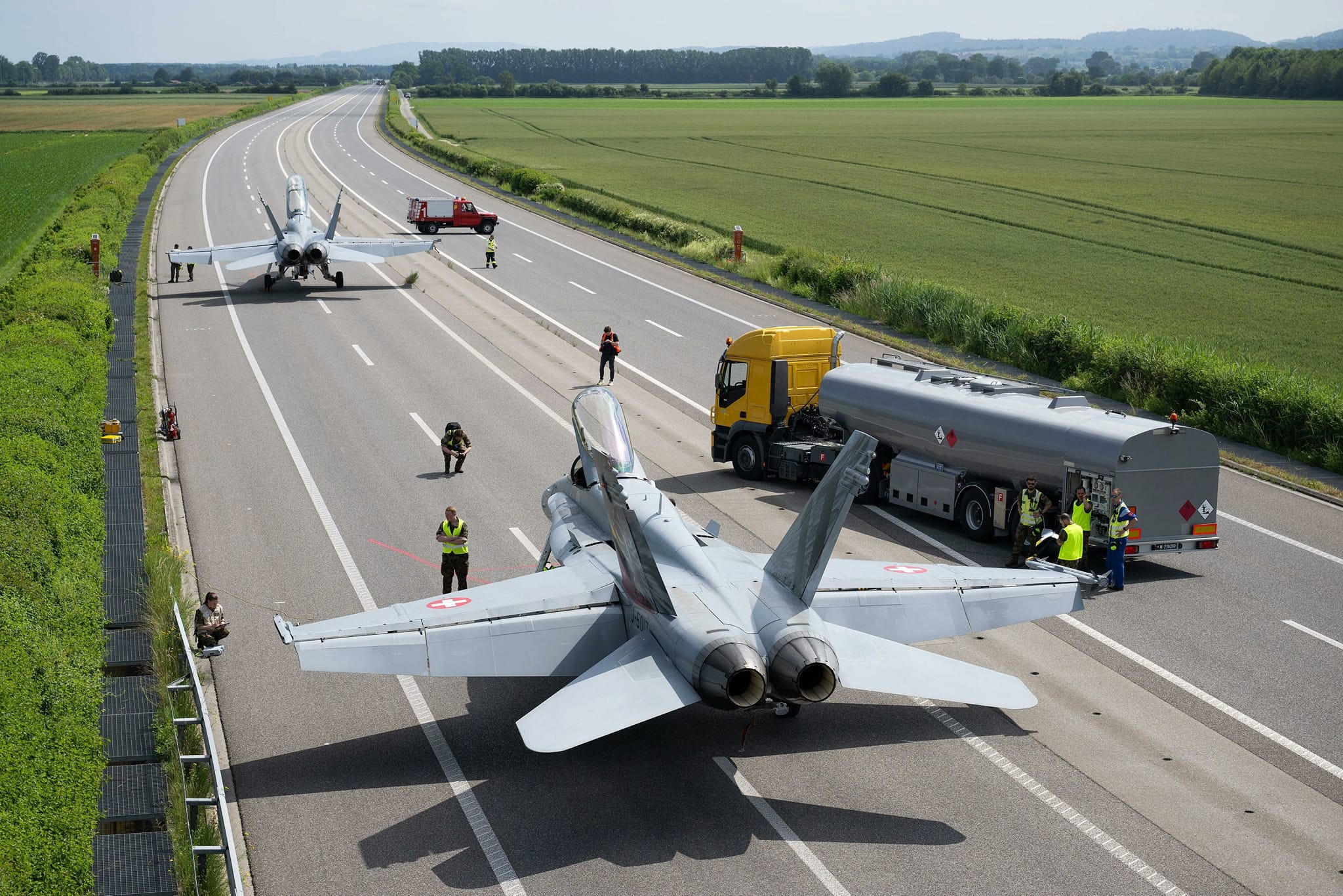 Swiss F/A-18 jets land on highway